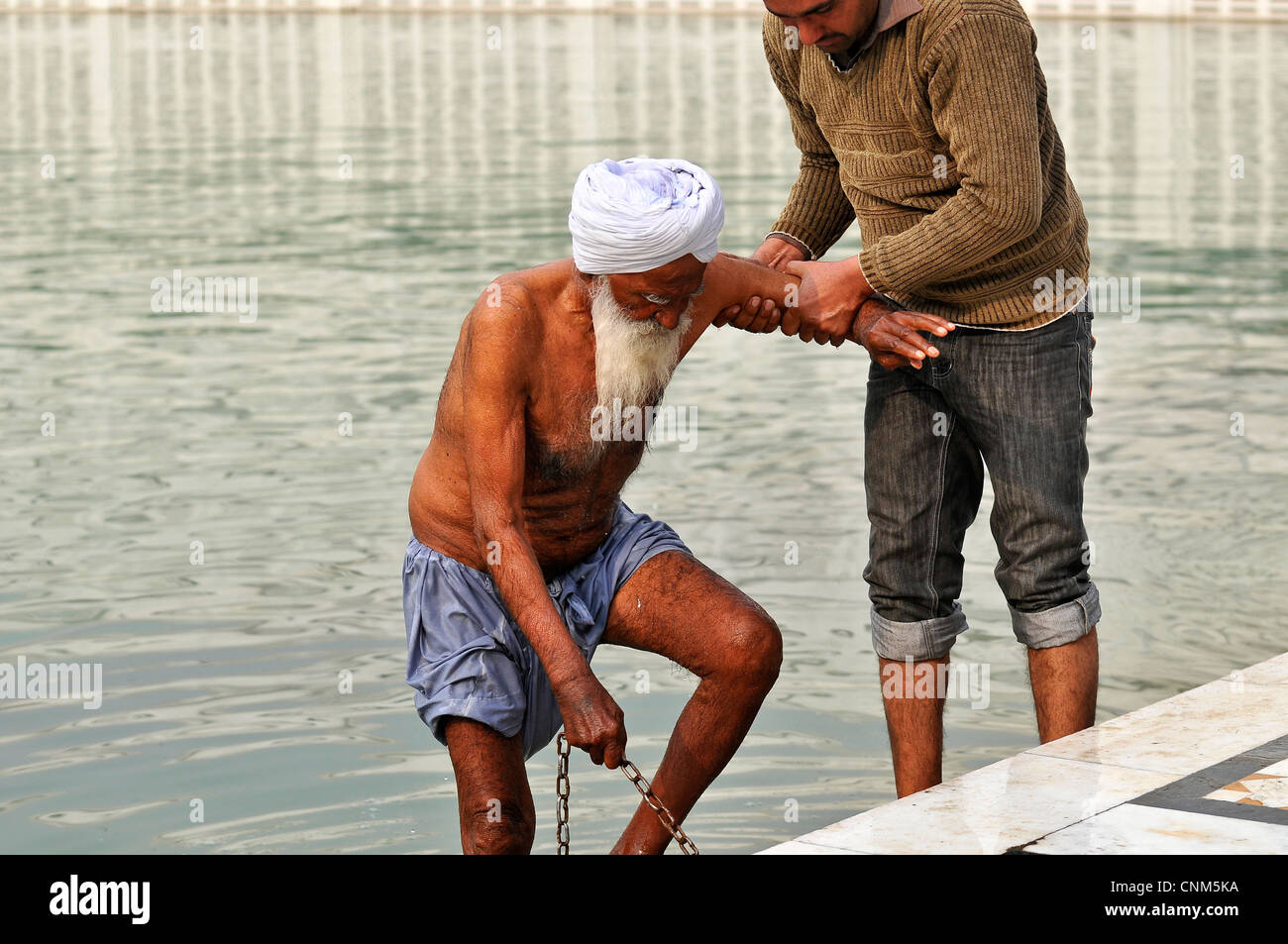 Asia India Punjab Amritsar Golden Temple, Hari Mandir A holy faithful ...