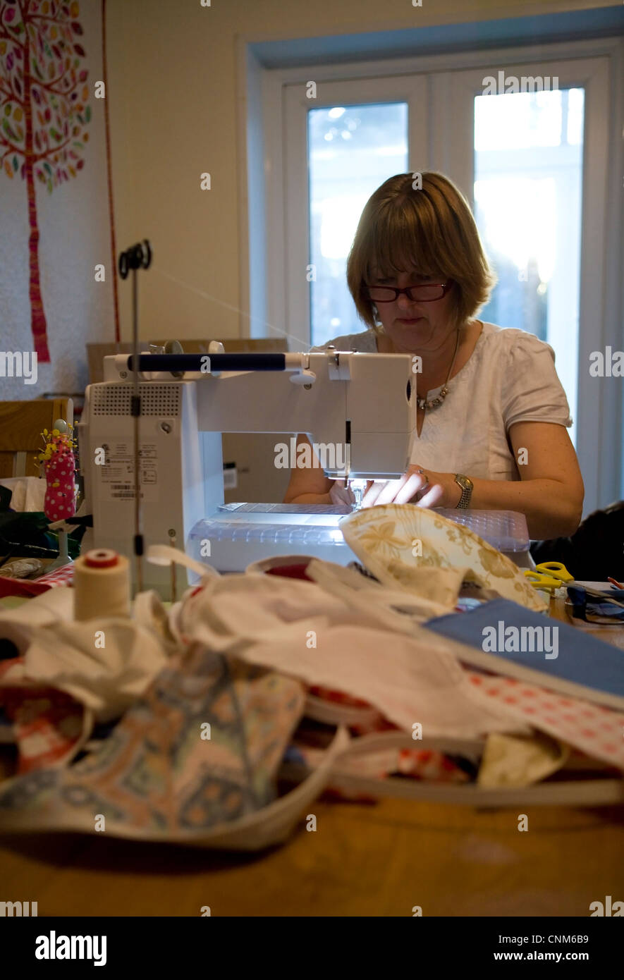 Person on sewing machine making Jubilee bunting Stock Photo - Alamy
