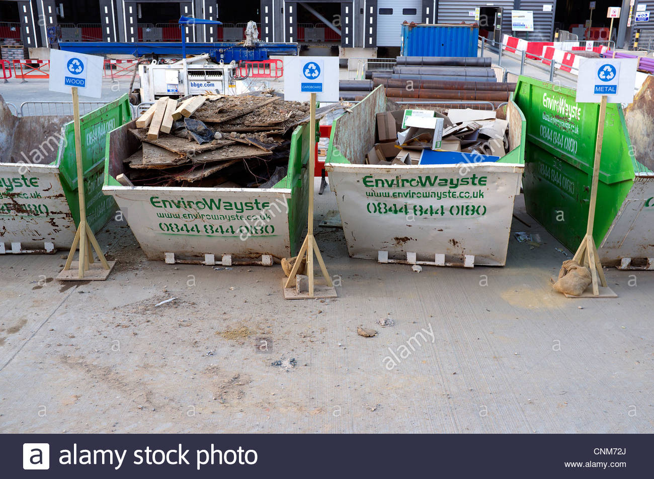Construction site skips for different waste materials for recycling ...