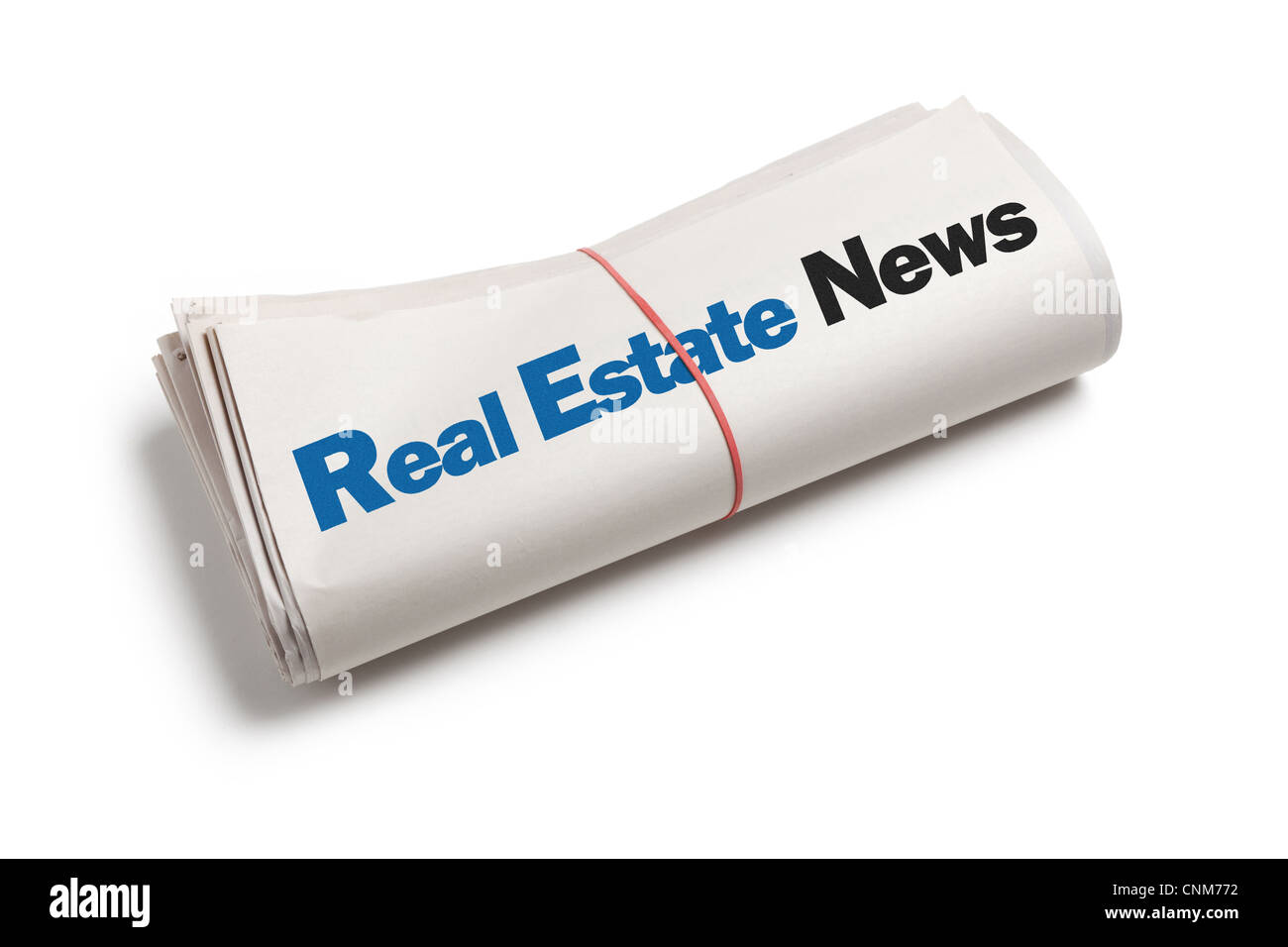 Real Estate News, Newspaper roll with white background Stock Photo - Alamy