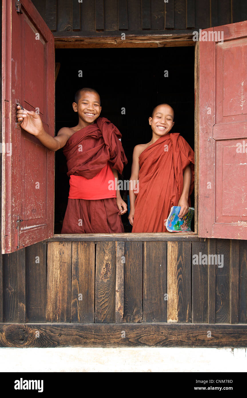 Buddhist monks at window of quarters, Kalaw Monastery, Burma Stock ...