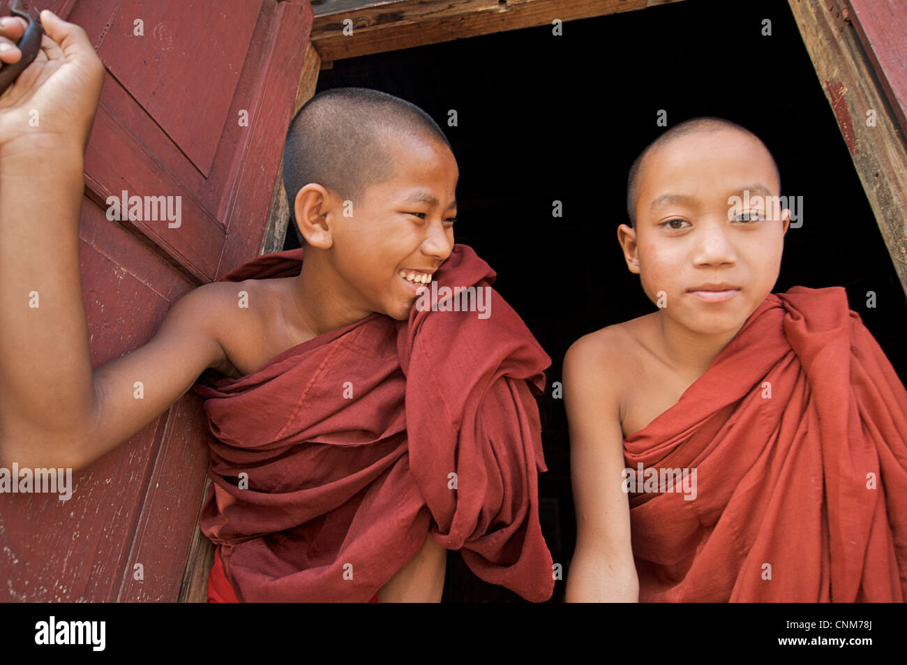 Buddhist monks at window of quarters, Kalaw Monastery, Burma Stock ...