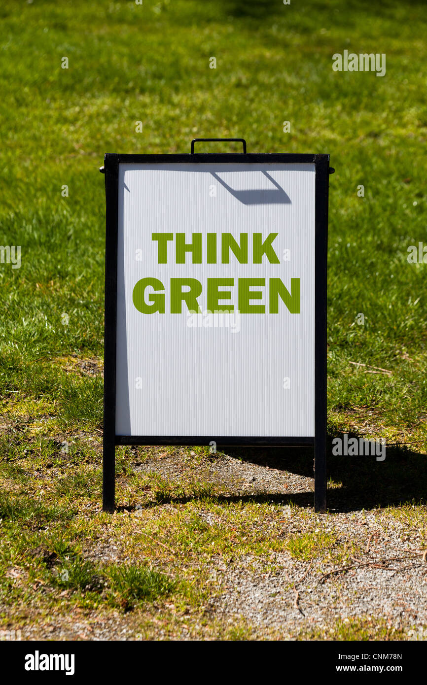 Think Green sign close up Stock Photo - Alamy
