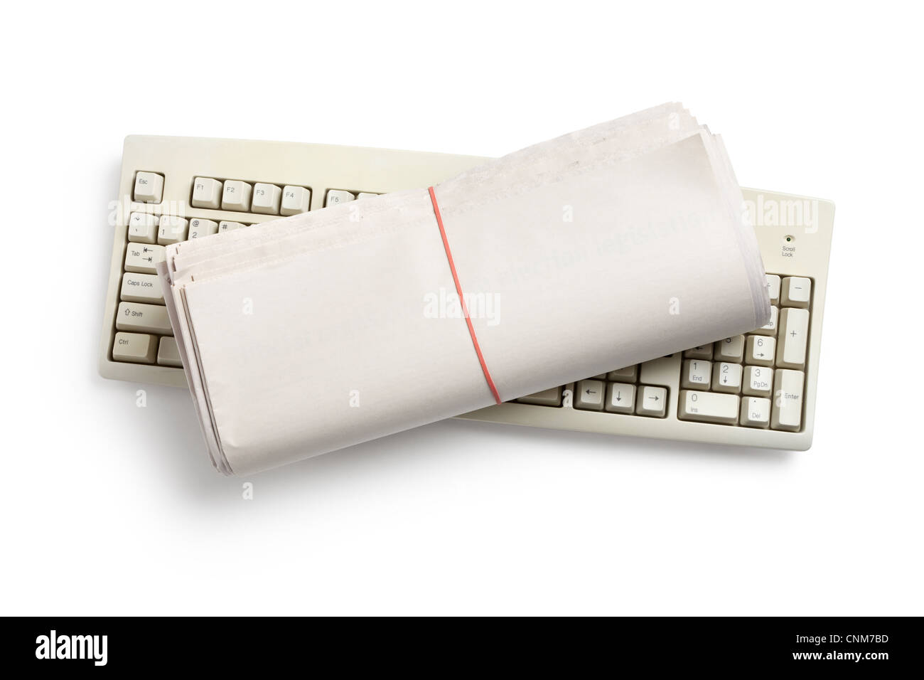 Computer Keyboard and Newspaper roll with white background Stock Photo ...