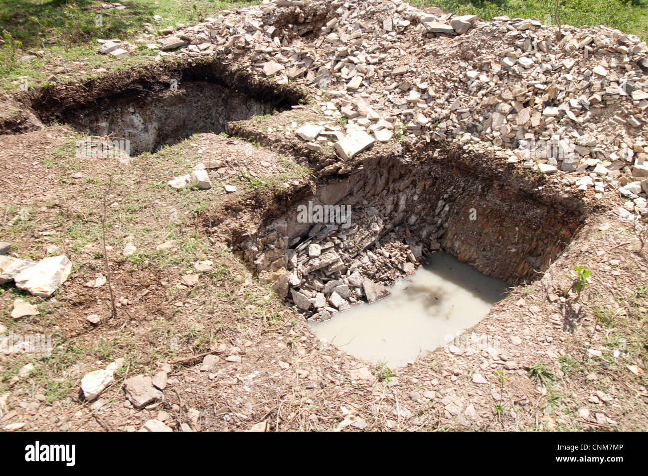 Drill sumps that have been dug in to the ground to recycle drilling ...
