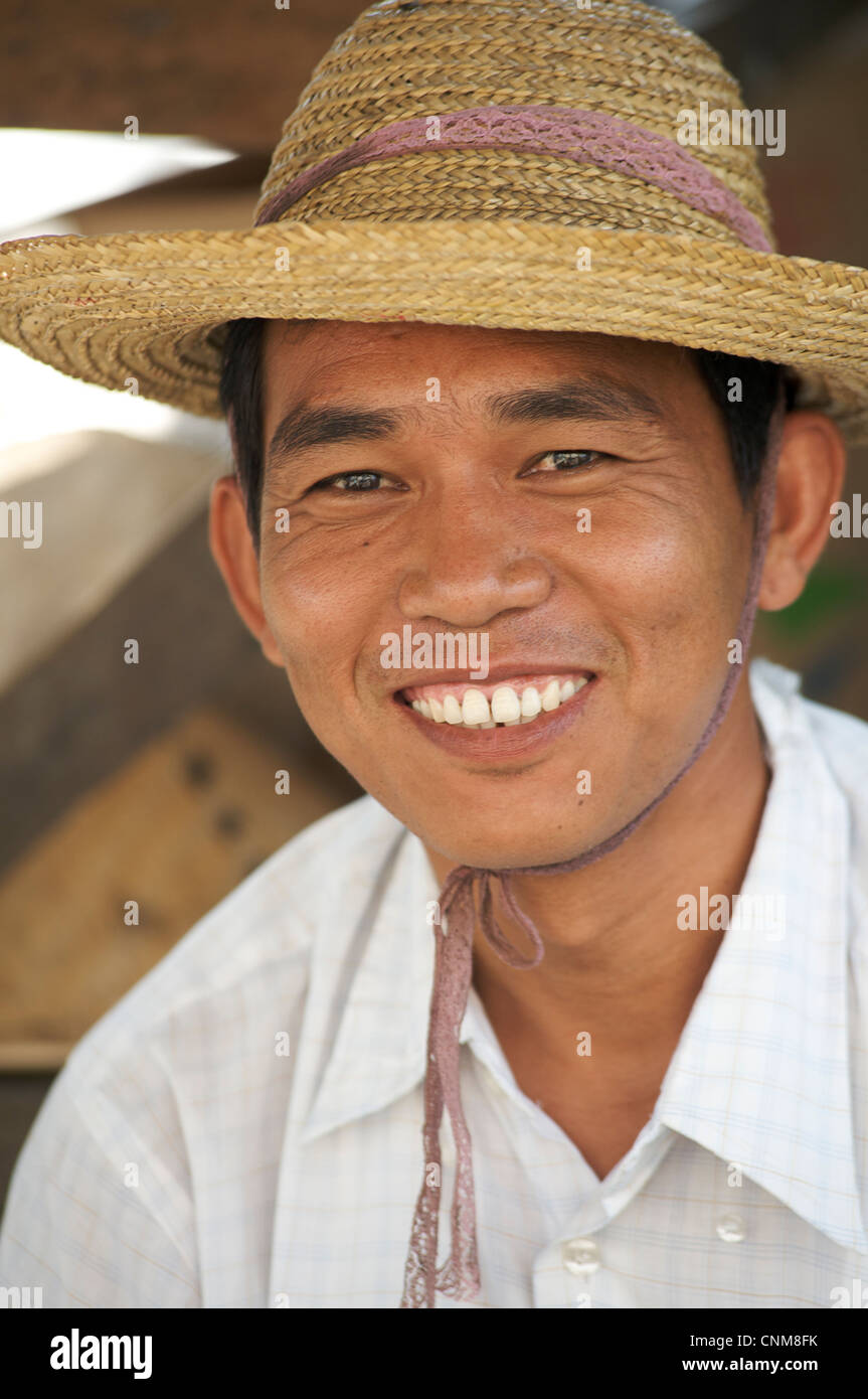 Portrait of a Burmese man in handmade Burmese hat. Mandalay, Burma ...