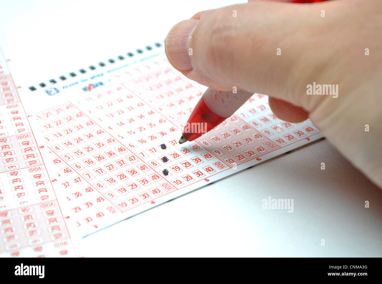 Picking your lucky number Stock Photo - Alamy