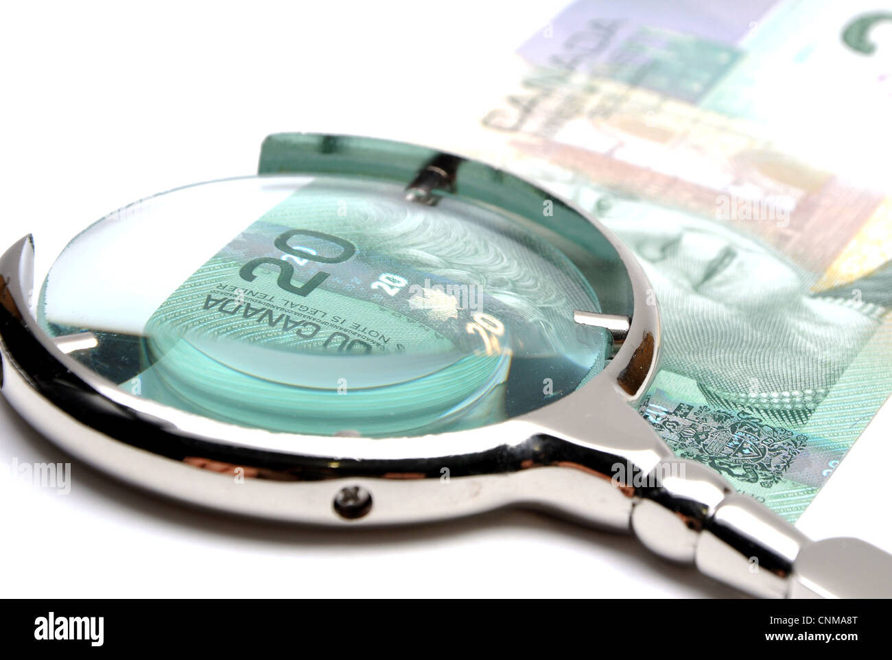 Money with magnifier background Stock Photo - Alamy