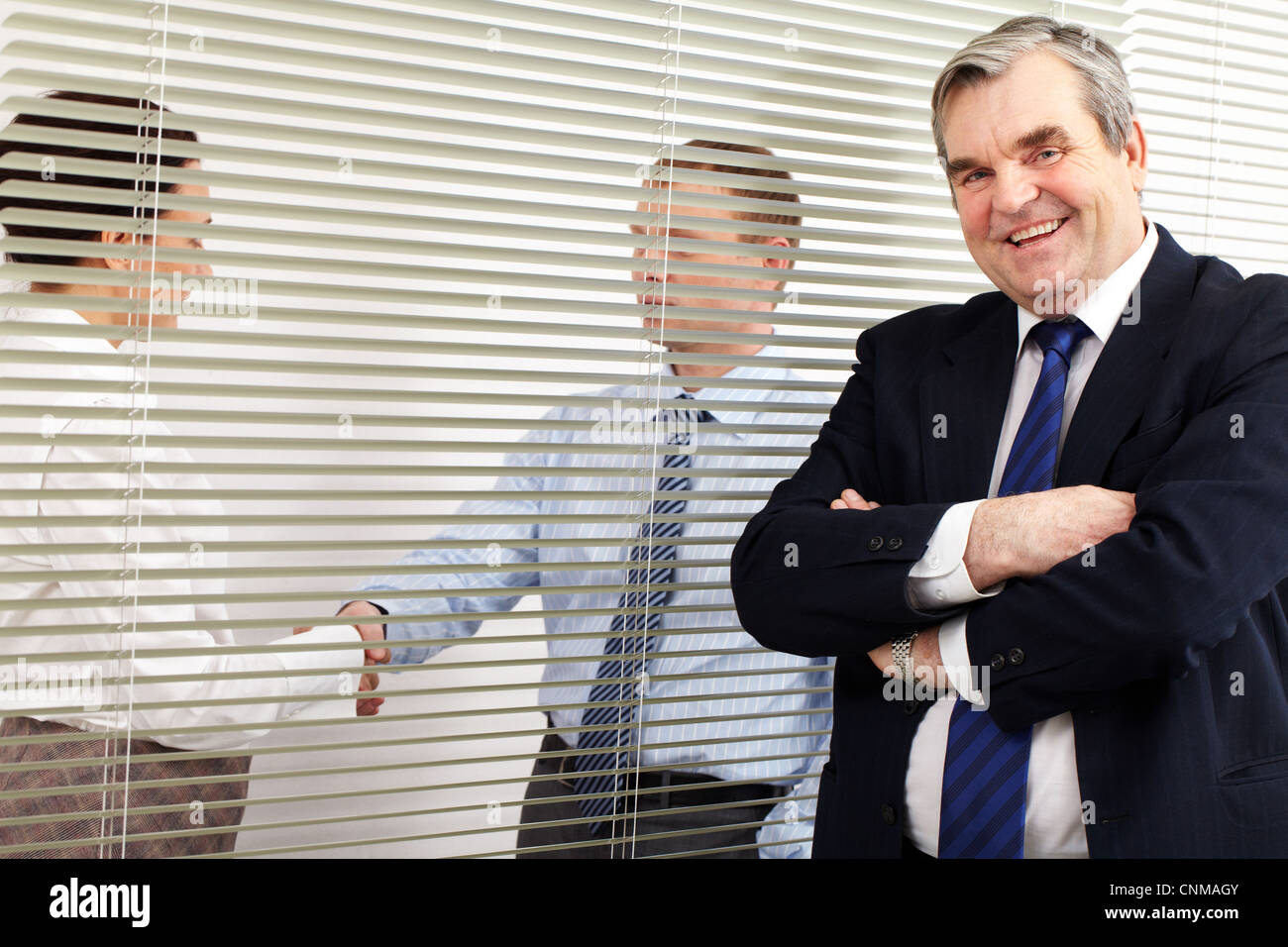 Portrait of a senior chief looking at camera in office Stock Photo - Alamy