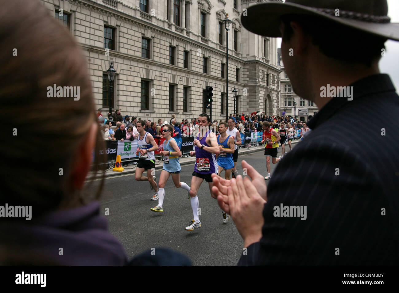 London, UK - April 25, 2010: Supporters watch and cheer thousands of ...