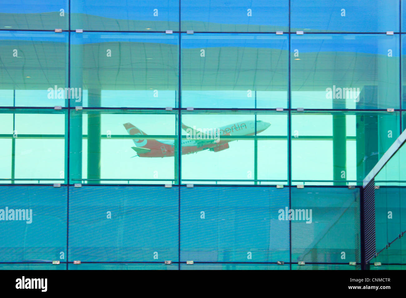 Reflection of an aircraft at Barcelona Airport, Spain Stock Photo - Alamy