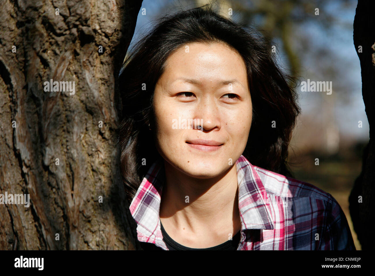 Portrait asian woman, looking off into distance Stock Photo - Alamy