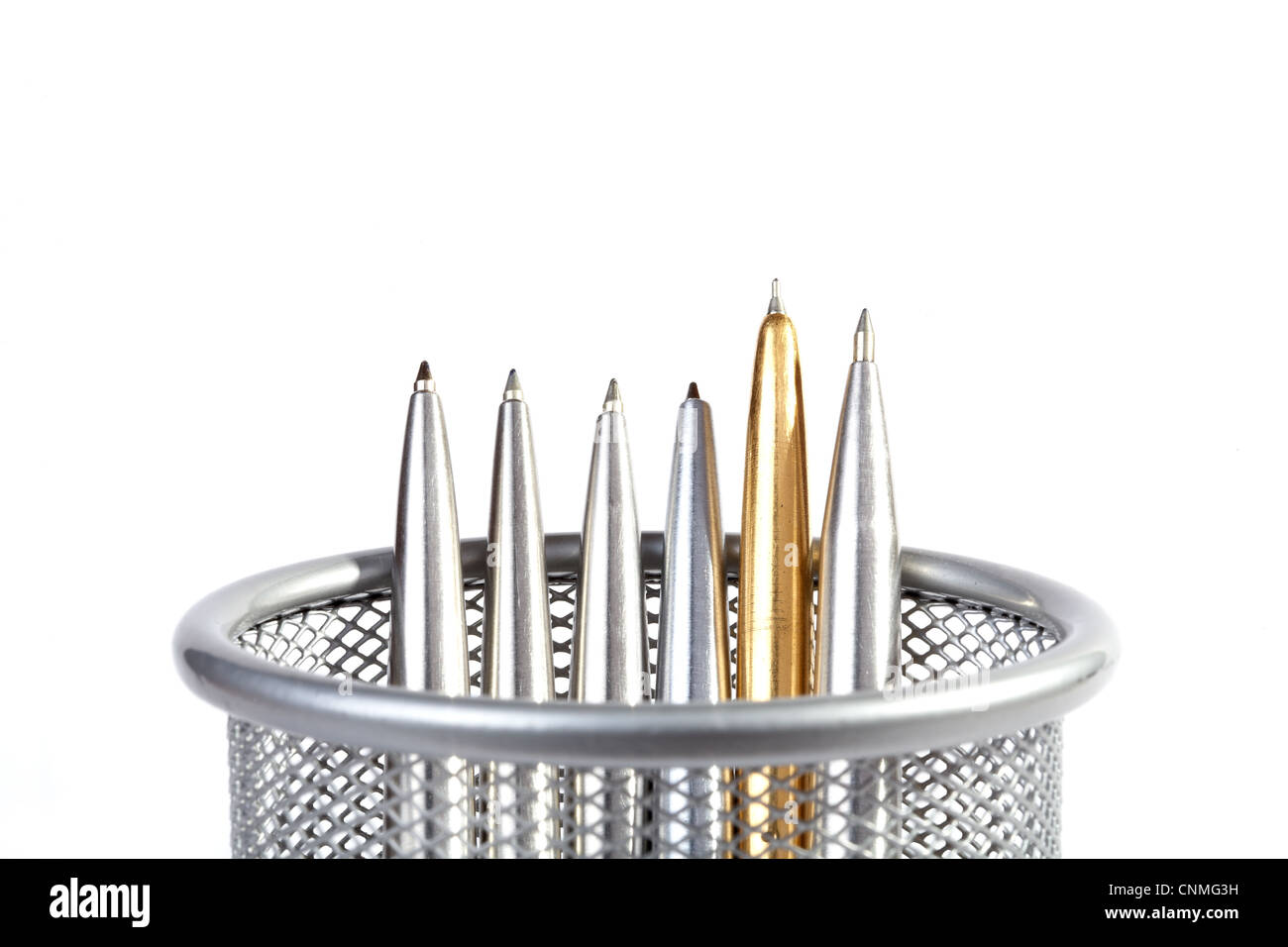 Metal ball-point pens in a support on white background Stock Photo - Alamy