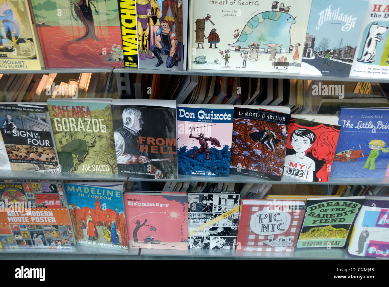 Comic books in a shop window display Stock Photo - Alamy