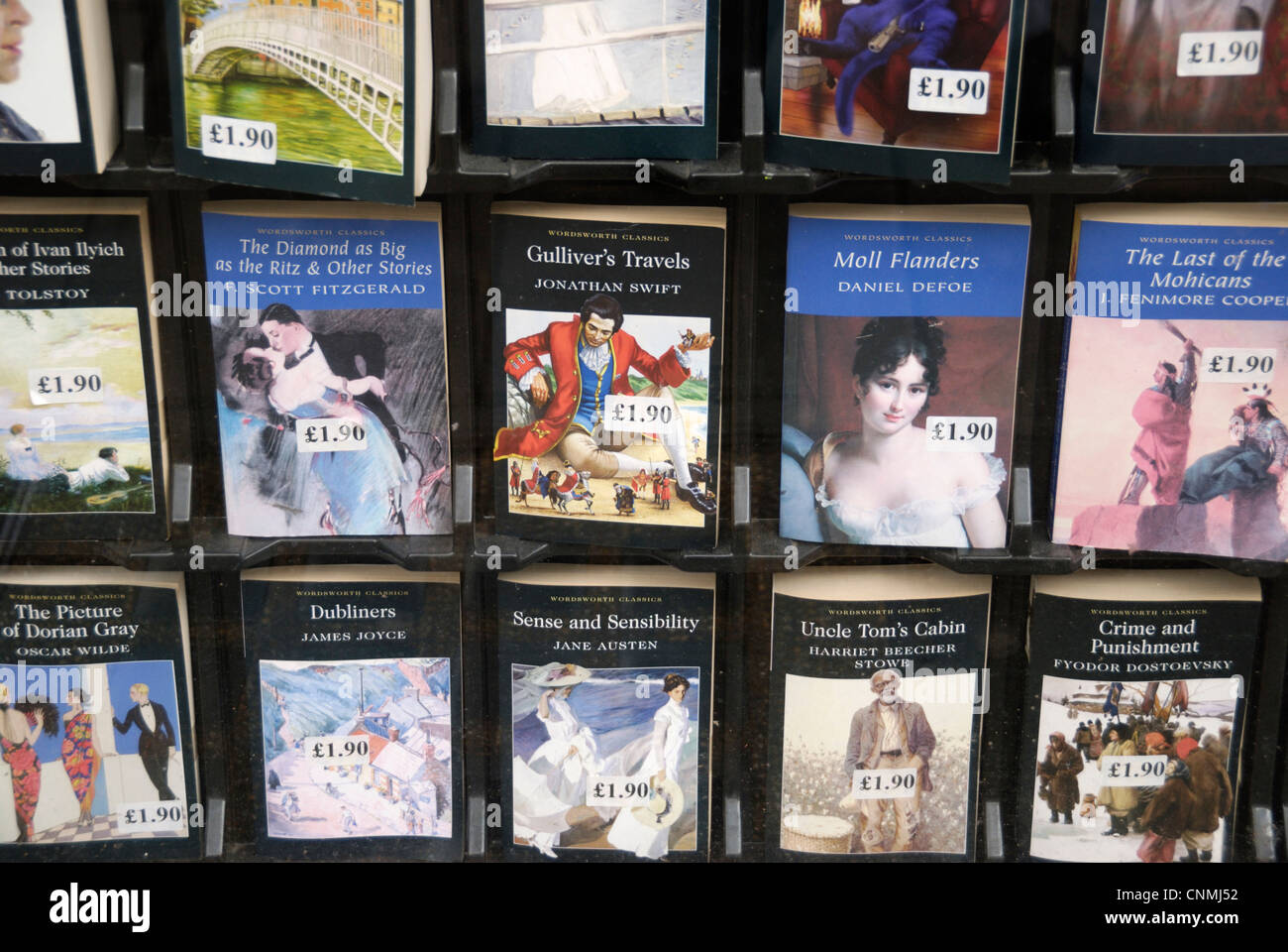 Classic novels in a shop window display Stock Photo - Alamy
