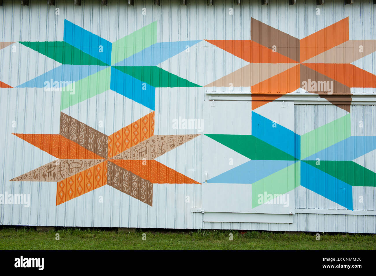 Quilted star pattern mural painted on the side of a barn Stock Photo ...