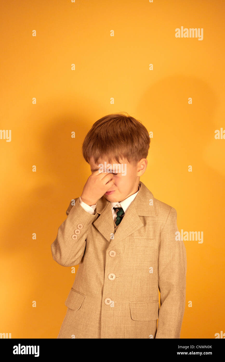Boy crying during photo session in a studio Stock Photo - Alamy