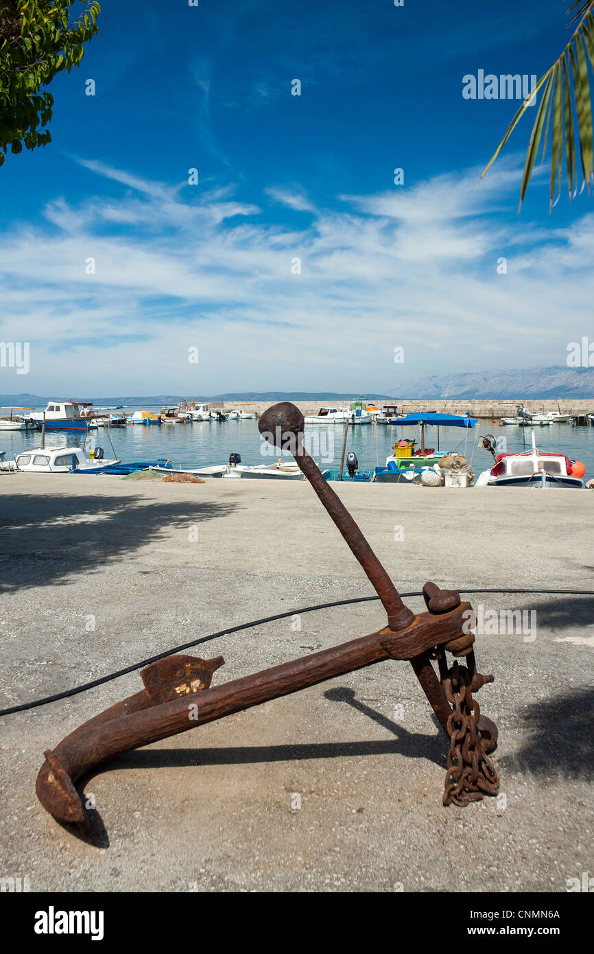Old rusty anchor at the harbour in Trpanj, Croatia Stock Photo - Alamy