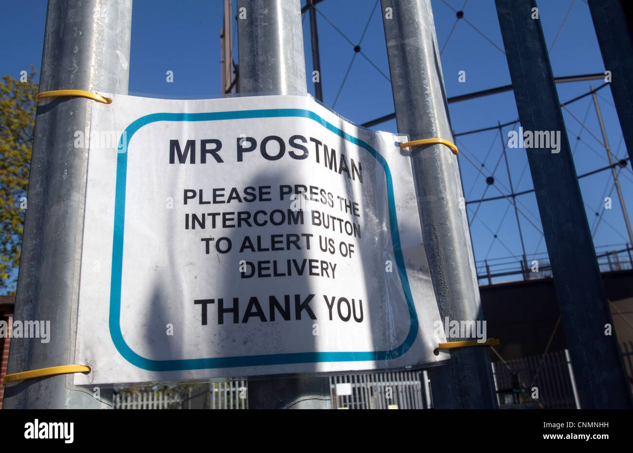 Laminated sign on the gate of a gas board building Stock Photo - Alamy