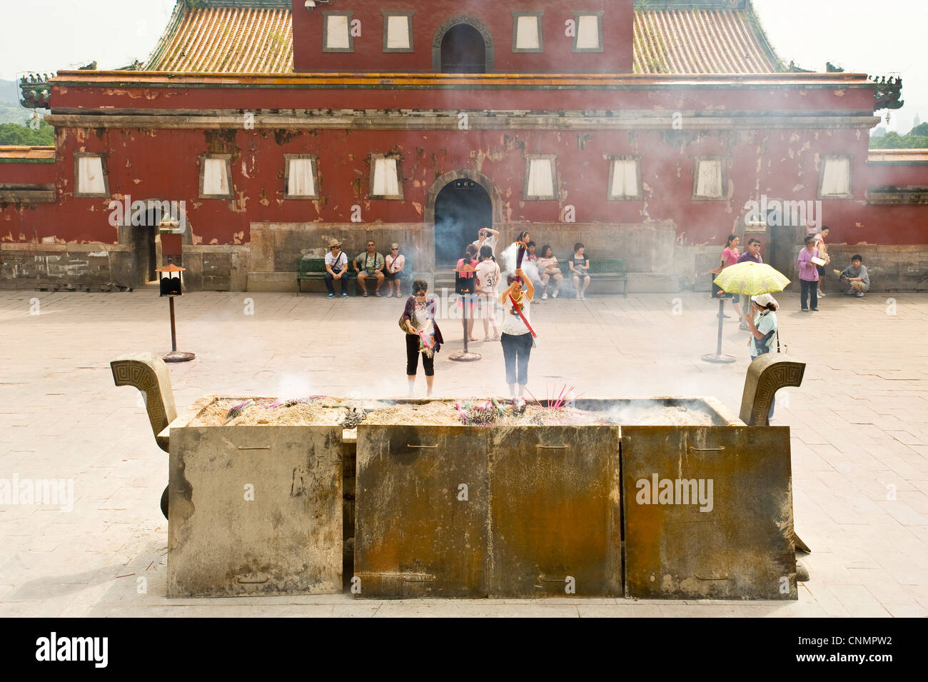 Incense burning inside temple hi-res stock photography and images - Alamy