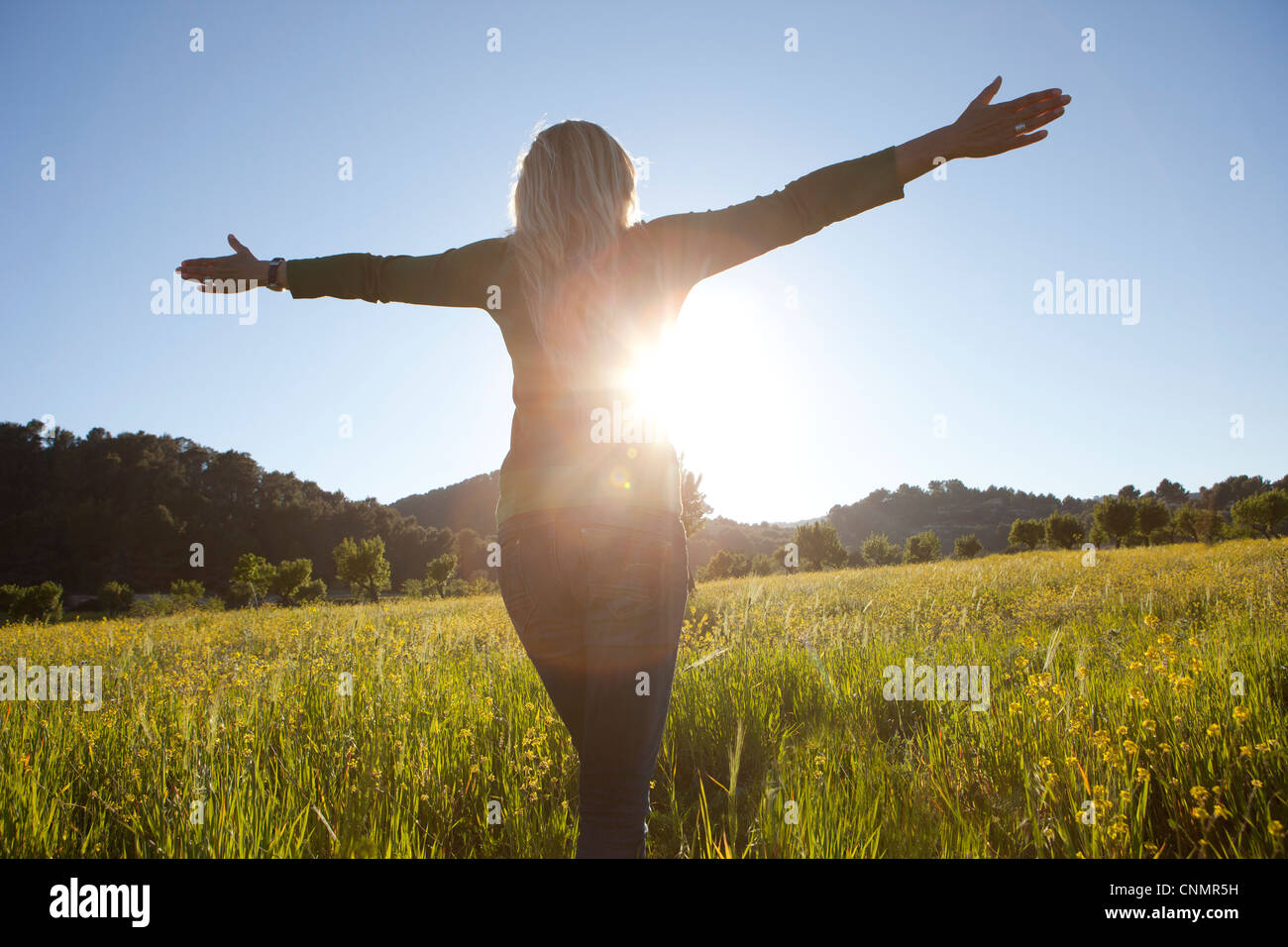 Woman sun worshiping hi-res stock photography and images - Alamy