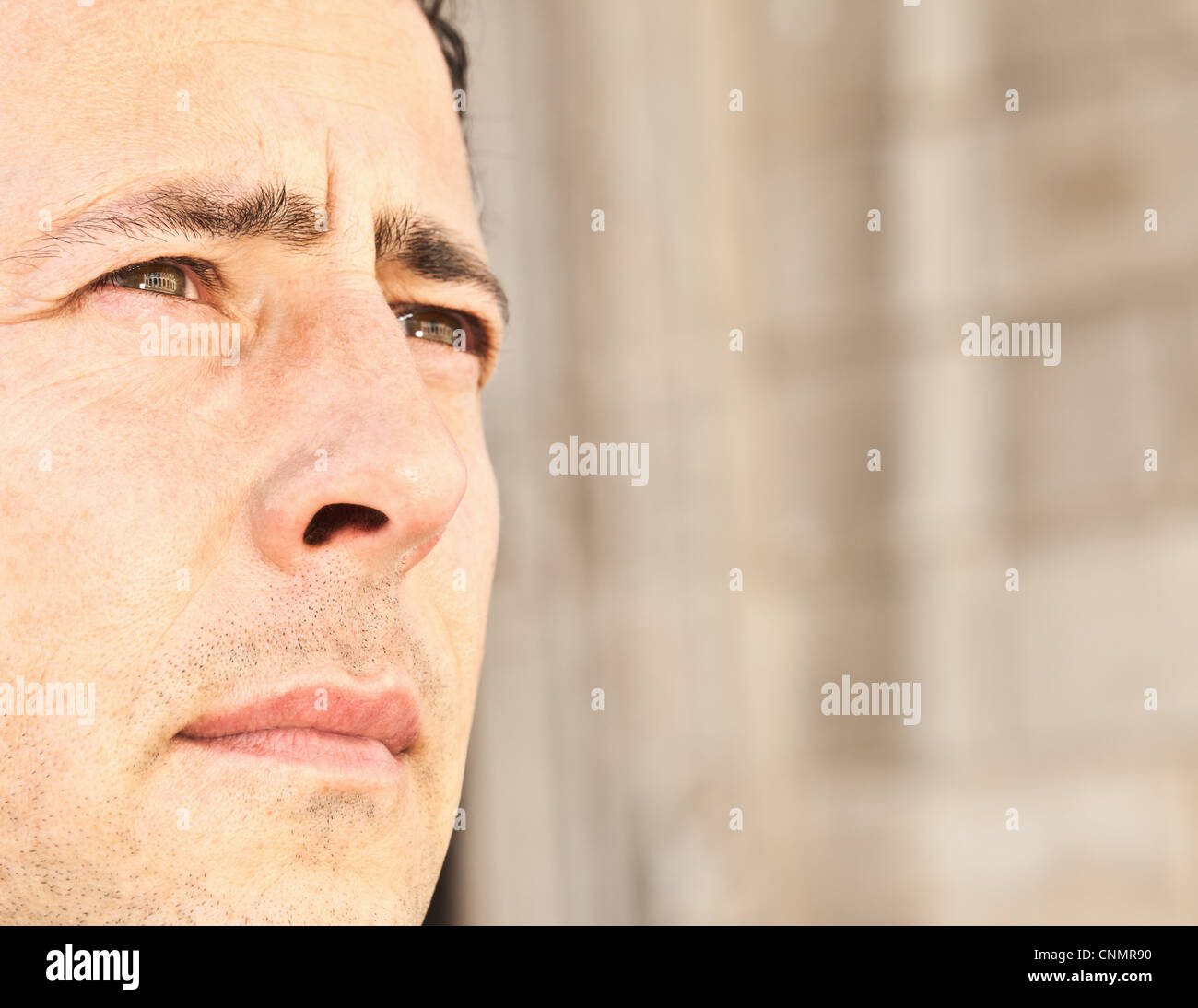 Close up of businessman’s serious face Stock Photo - Alamy