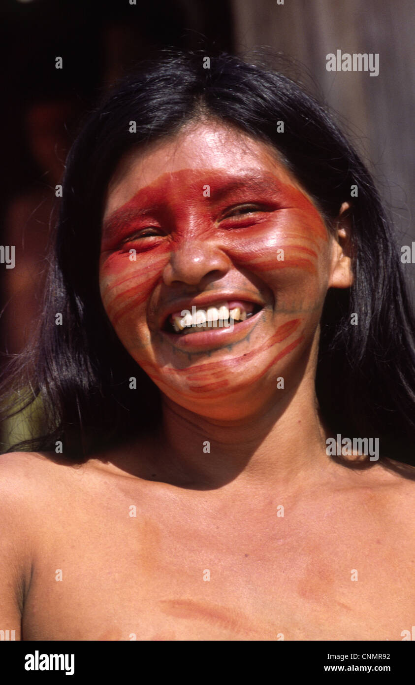 Matsés woman with tribal face tattoo and painting. Chobayacu river ...