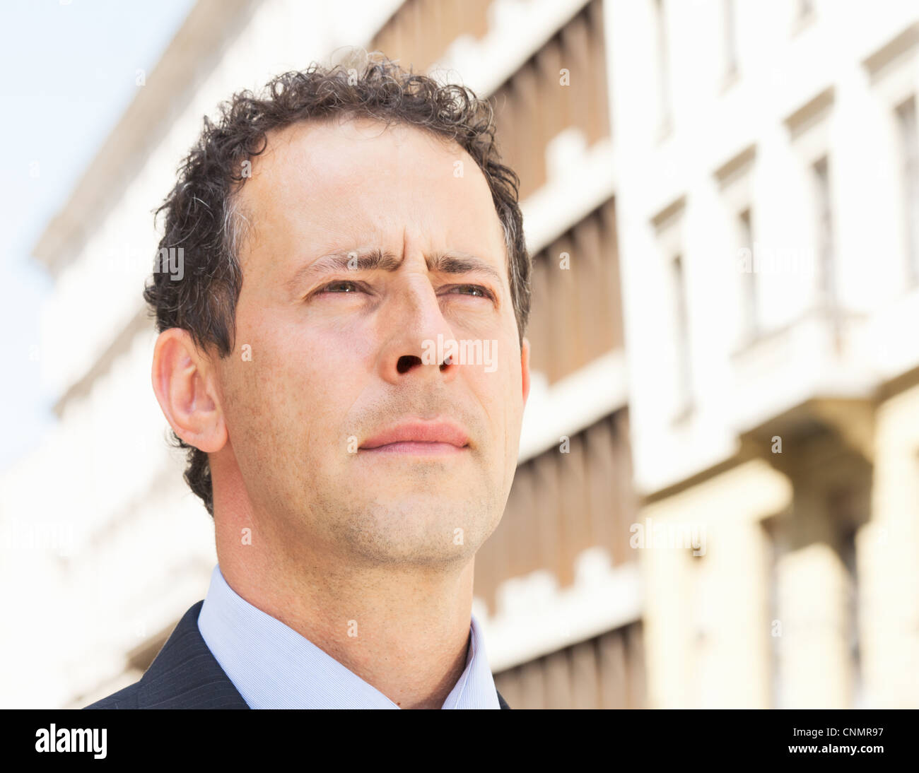 Close up of businessman’s serious face Stock Photo - Alamy