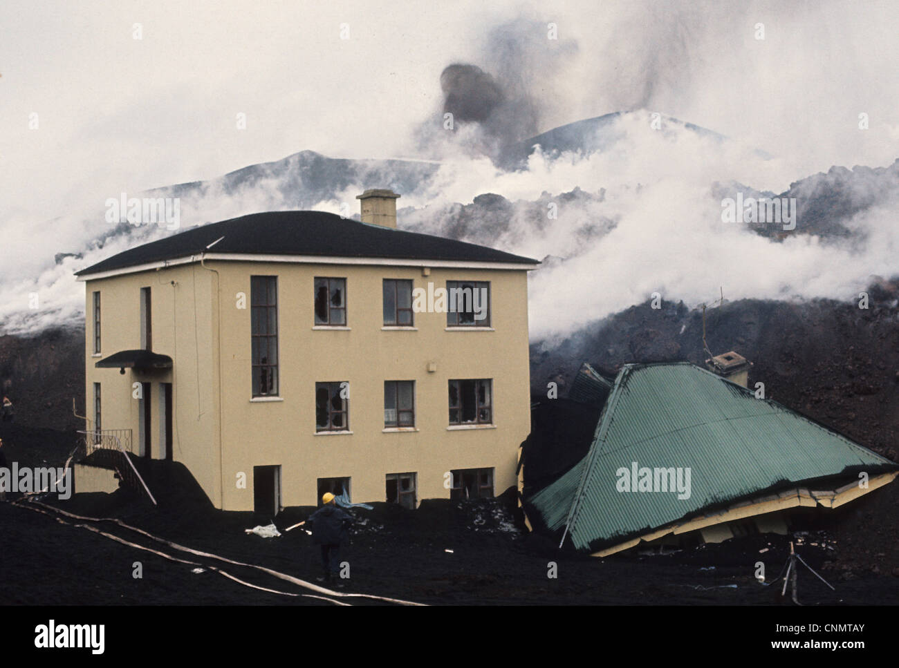 Destruction town following eruption volcano buildings engulfed in lava ...