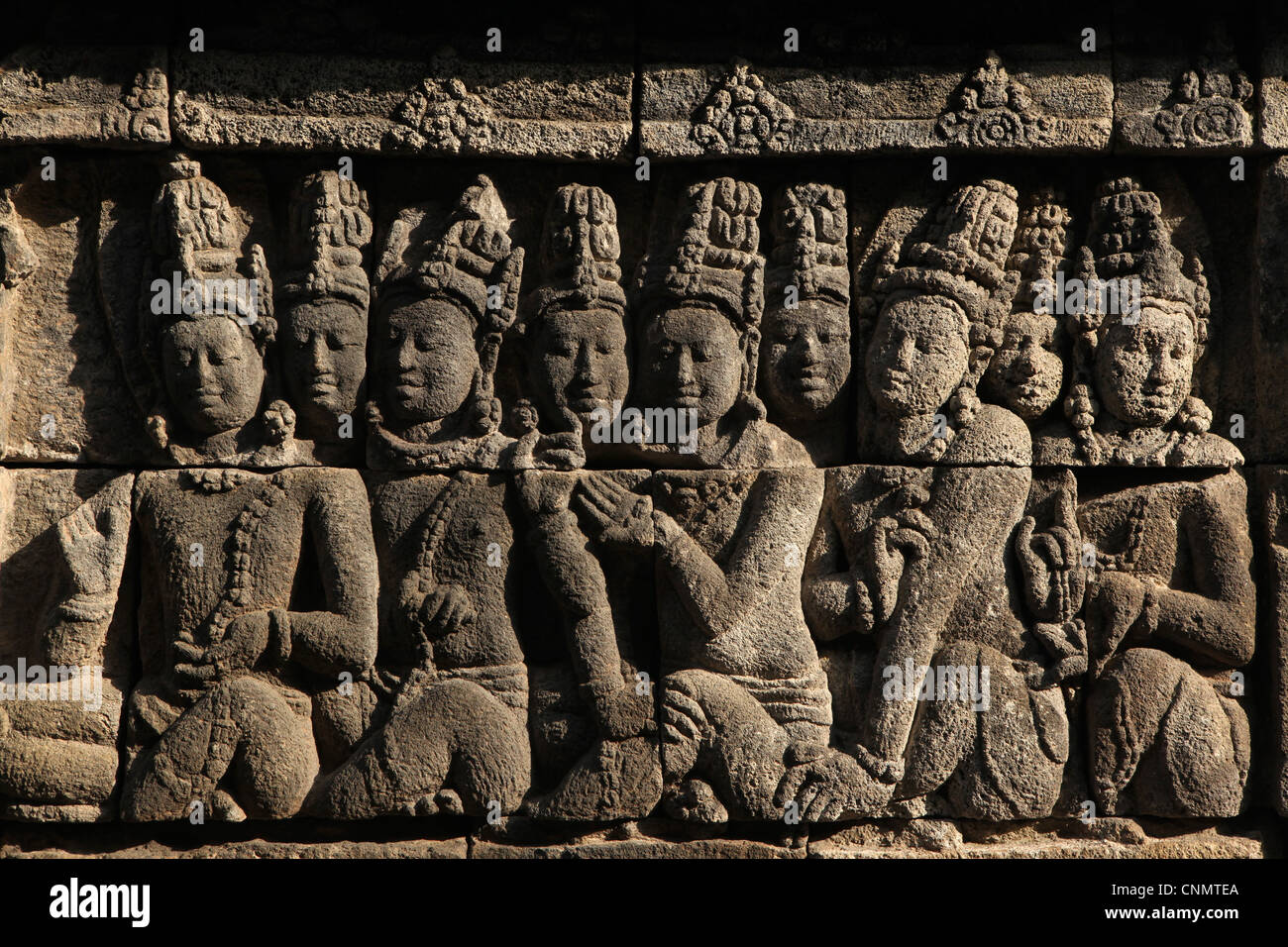 Stone bas relief from the Borobudur Temple in Magelang, Central Java ...