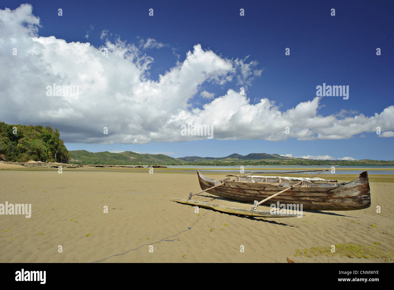 View of sandy beach with small boat, Nosy Be, Madagascar Stock Photo ...