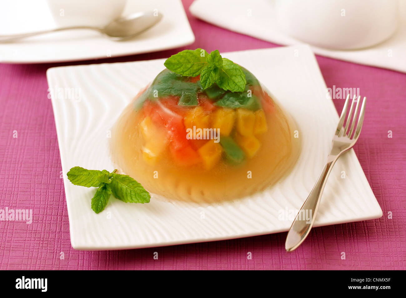 Candied fruits and tea jelly. Recipe available Stock Photo - Alamy