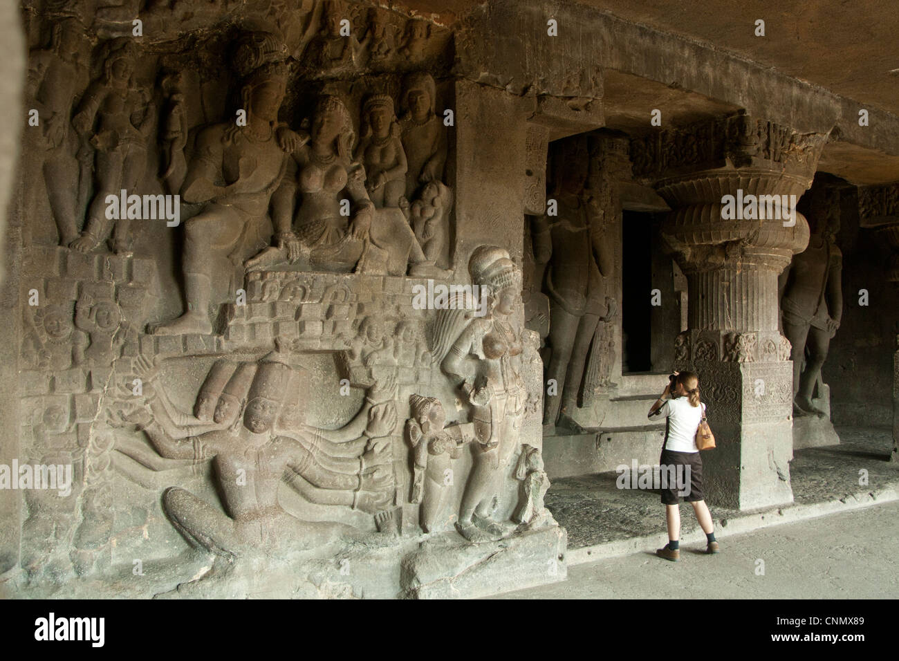 Women photographing Elora cave, India Stock Photo - Alamy