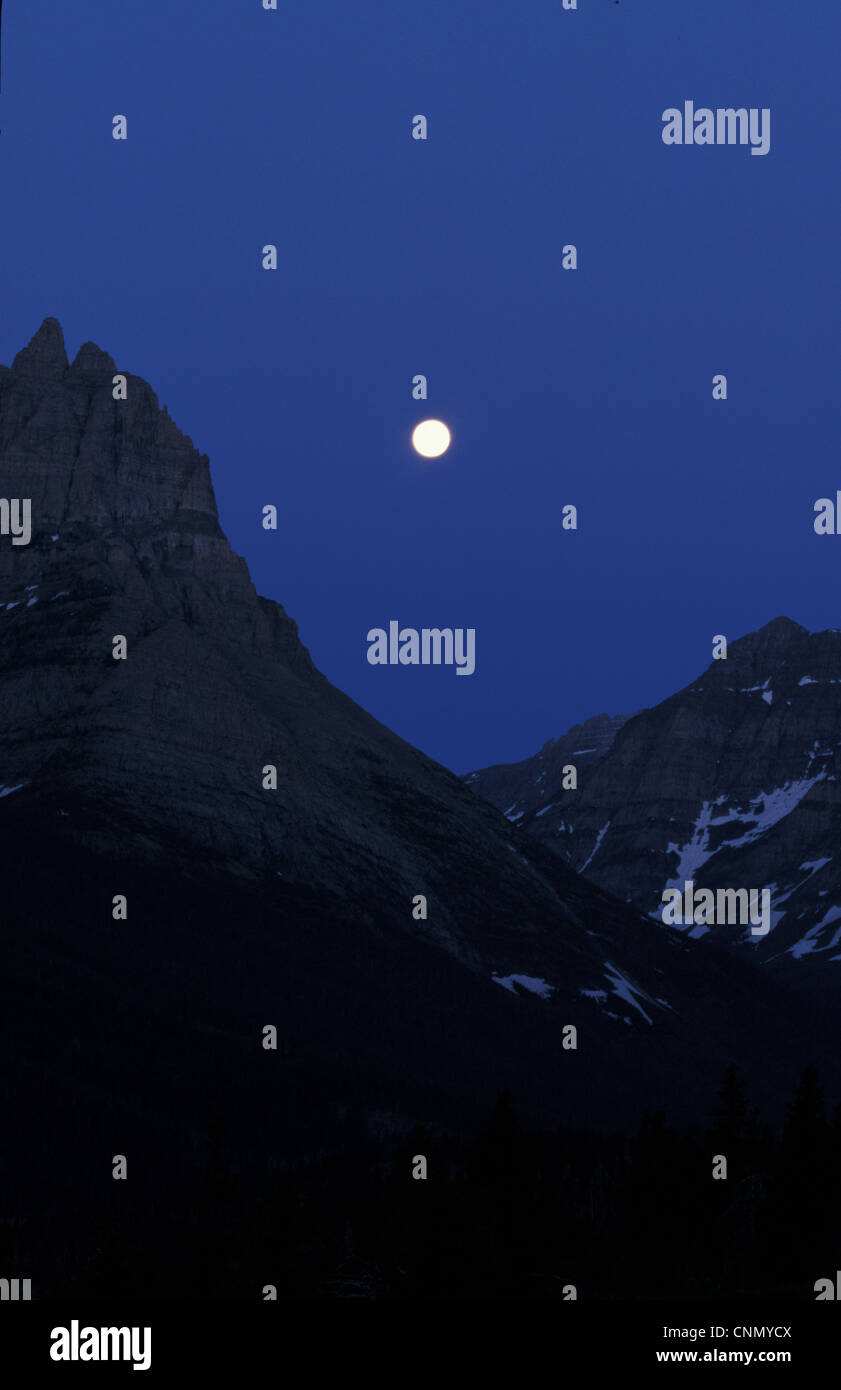 Montana The moon over mountain range, Glacier National Park, Montana ...