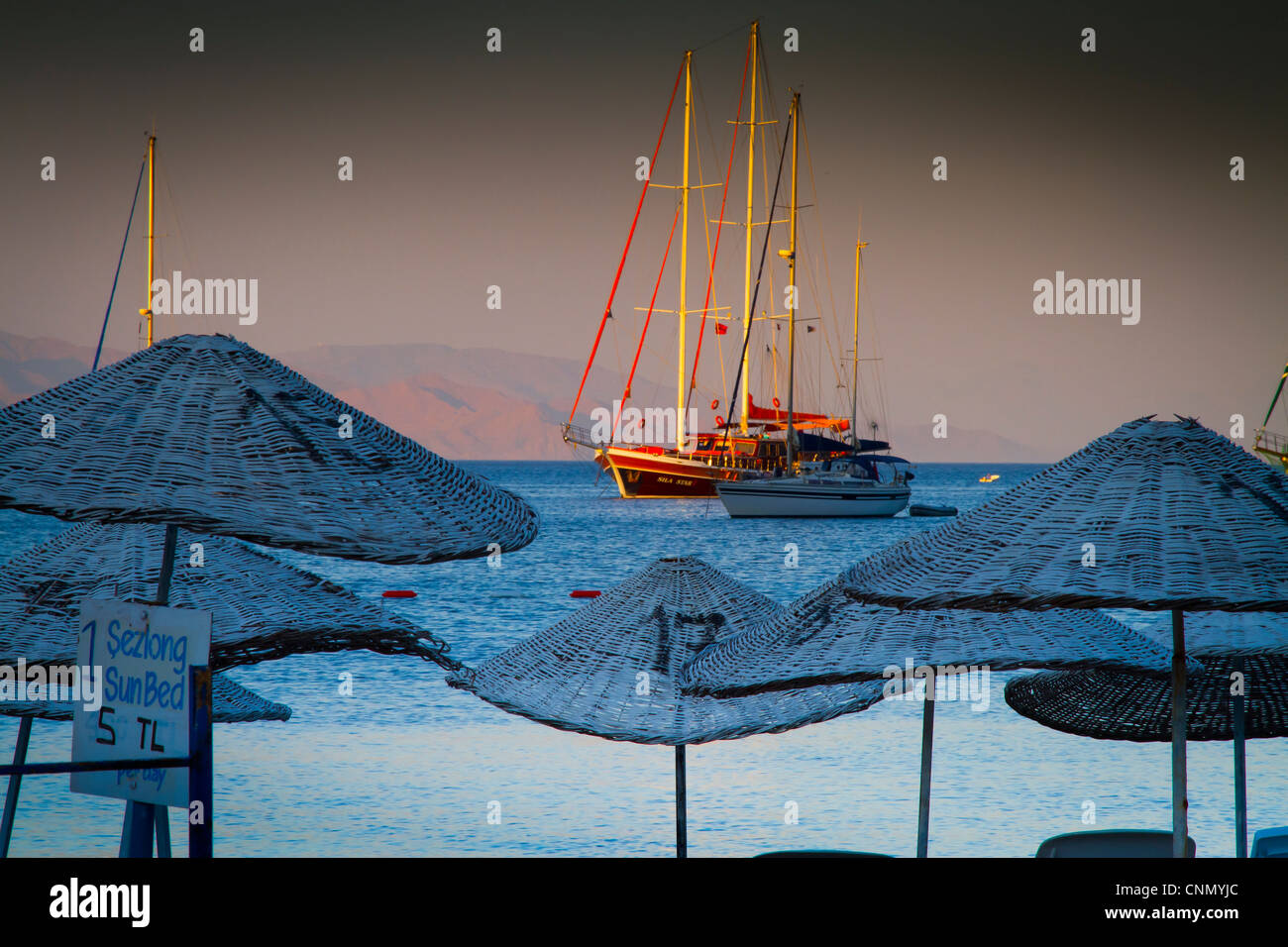 Beach and sailboat. Datca city. Datca peninsula, Mugla province ...