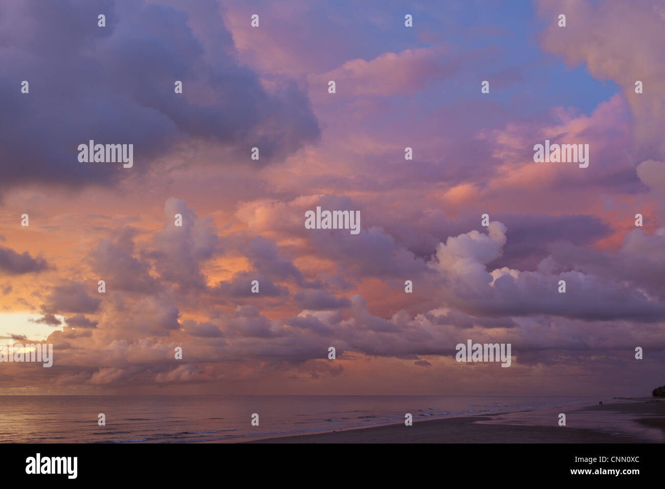 Clouds over beach at sunset, South China Sea, Sabah, Borneo, Malaysia ...