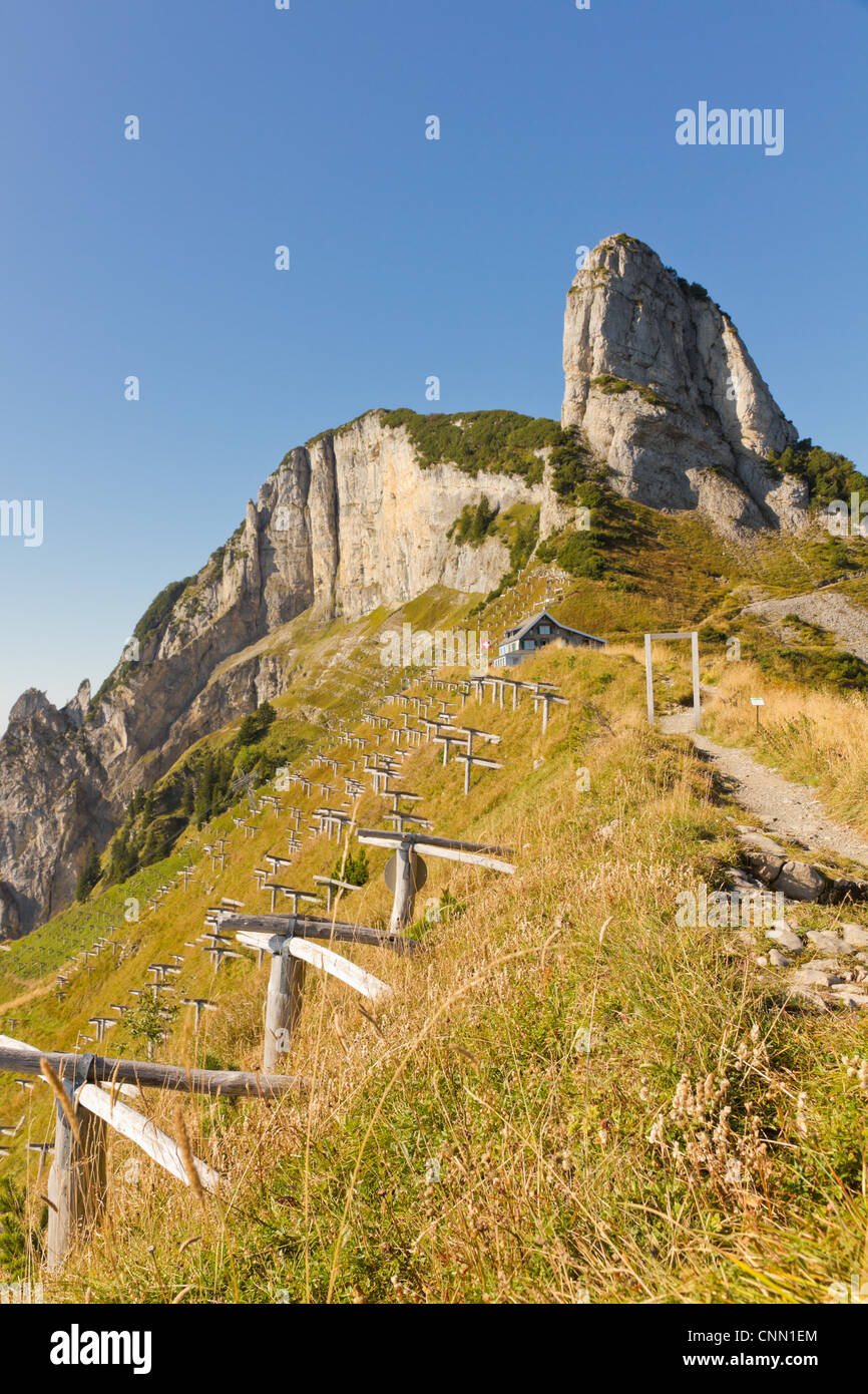 hiking path through rocky mountainous terrain with avalanche protection ...