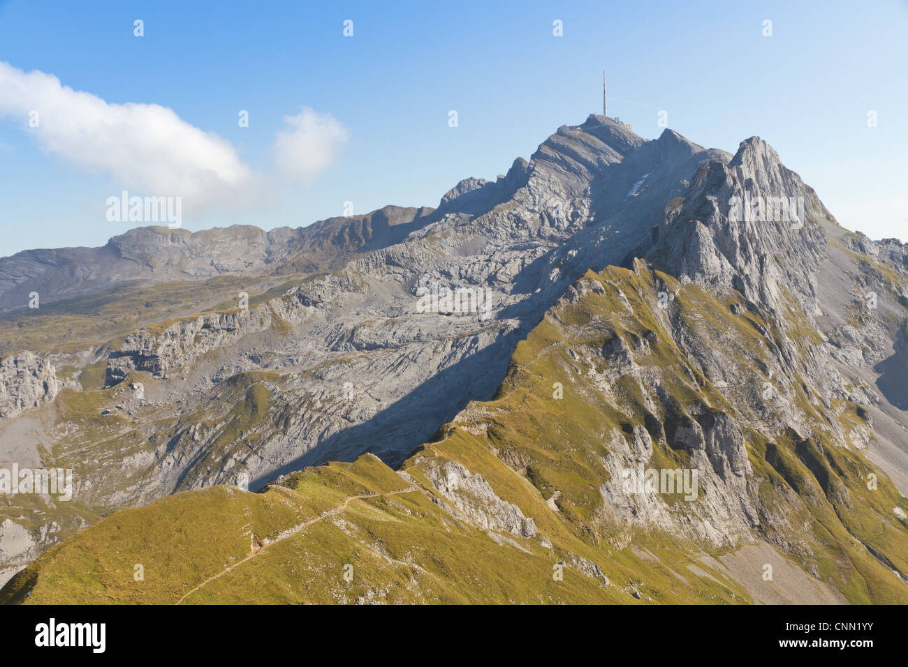 hiking path through rocky mountainous terrain leading over ridges with ...
