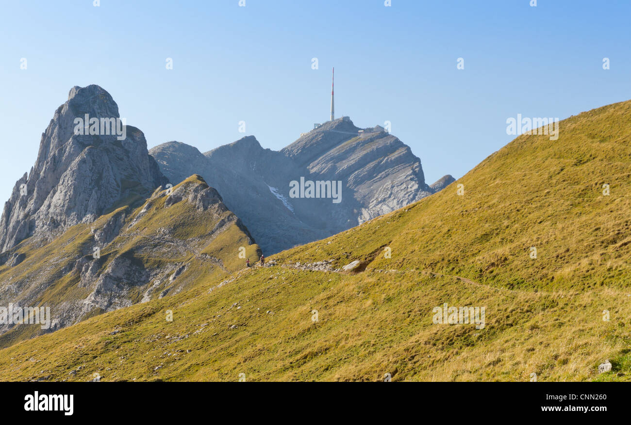 hiking path through rocky mountainous terrain leading over ridges with ...