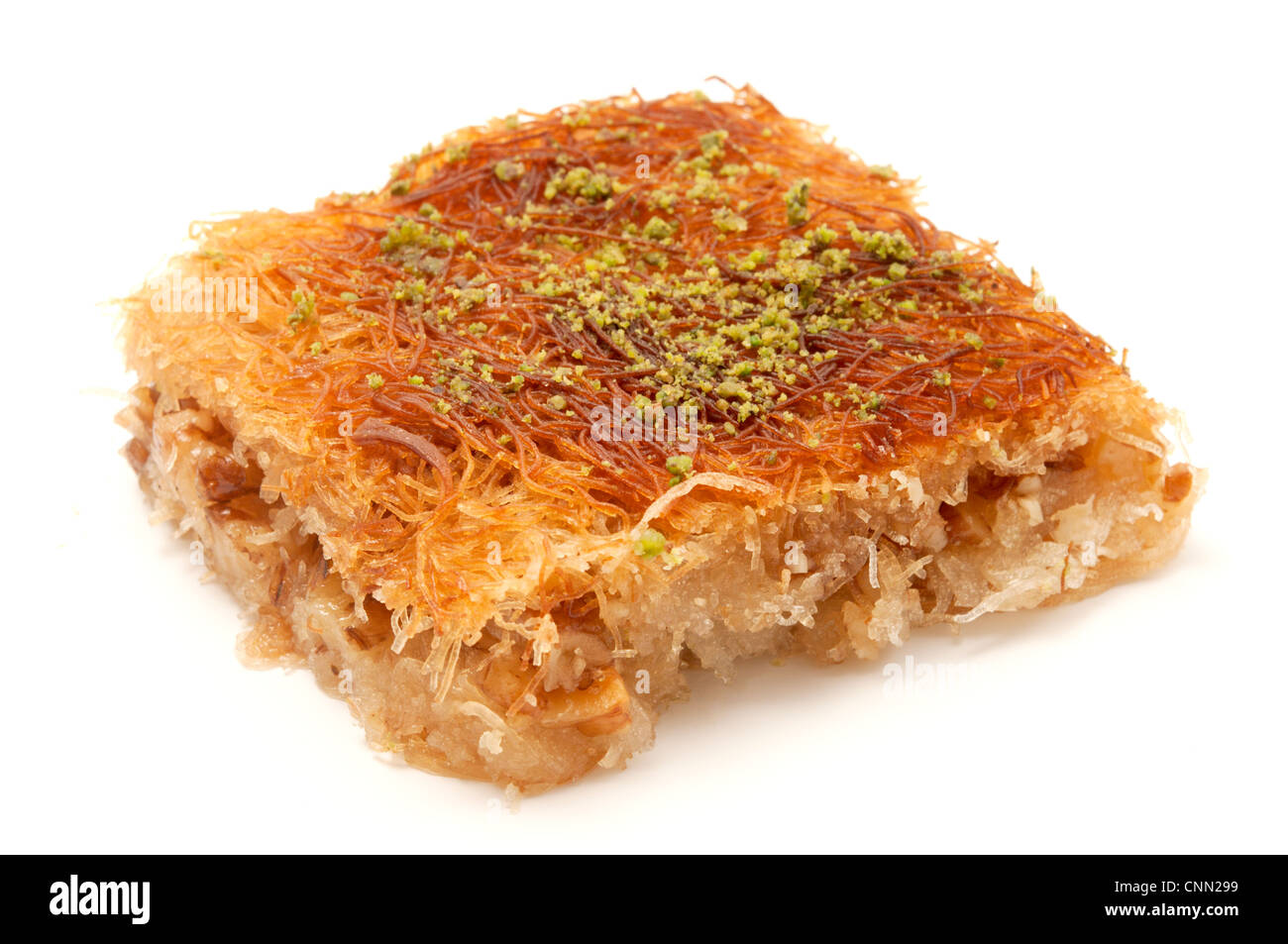 Kanafeh on a white background Stock Photo - Alamy