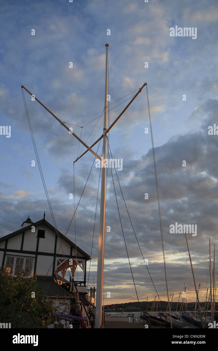 Signal mast at sailing club, in harbour at sunset, Bembridge Harbour ...