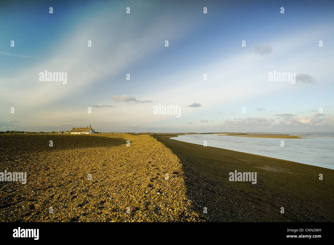 View of shingle beach, Shingle Street, Suffolk, England, march Stock ...