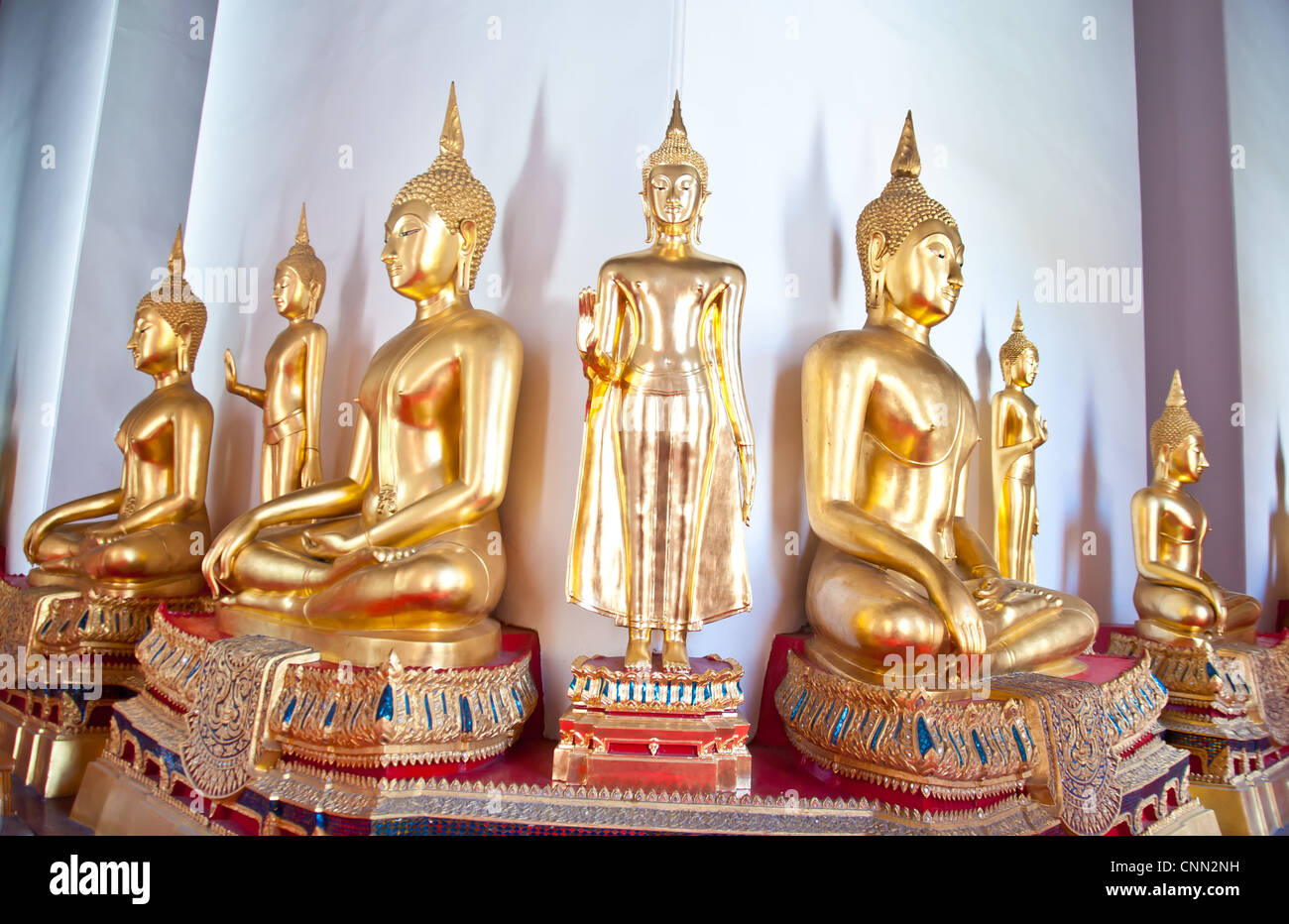 golden Buddha statue in the temple Stock Photo - Alamy