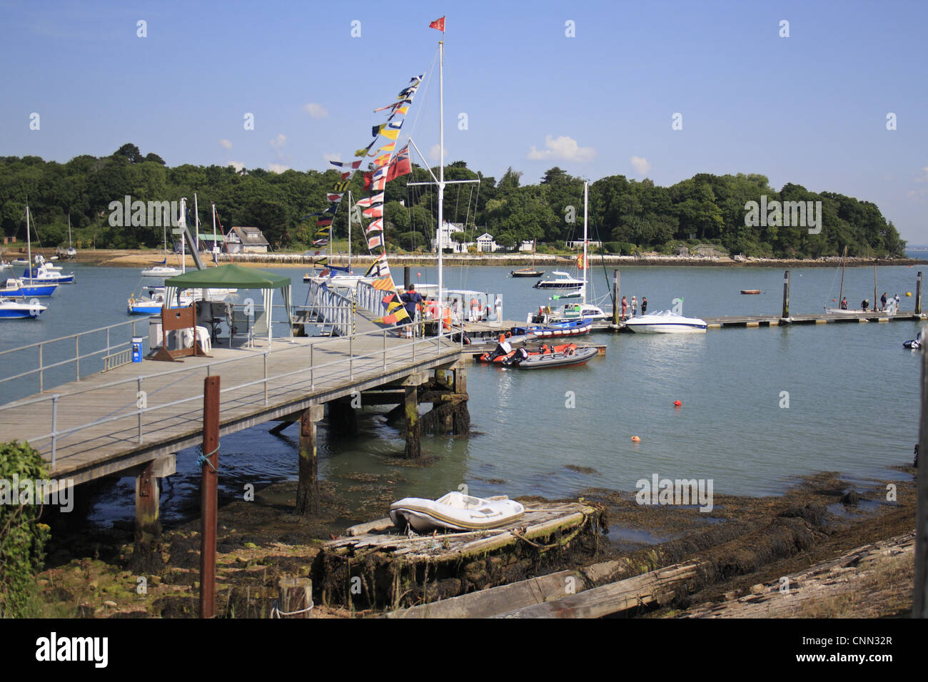 Boats at mooring in harbour, Wootton Creek, Fishbourne, Isle of Wight ...