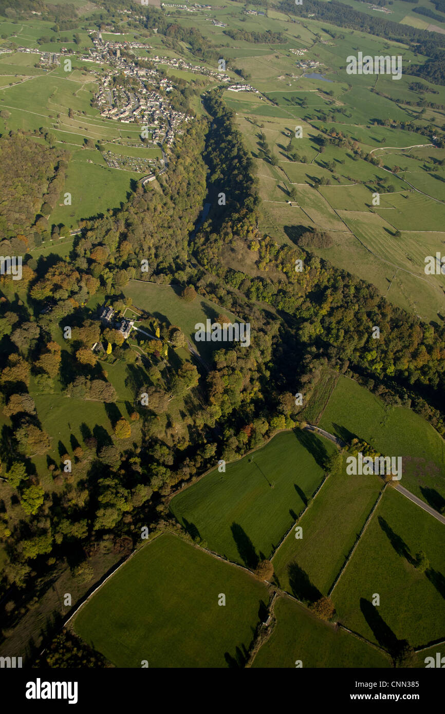 Aerial view of wooded valley, farmland and village, Bradford Dale ...