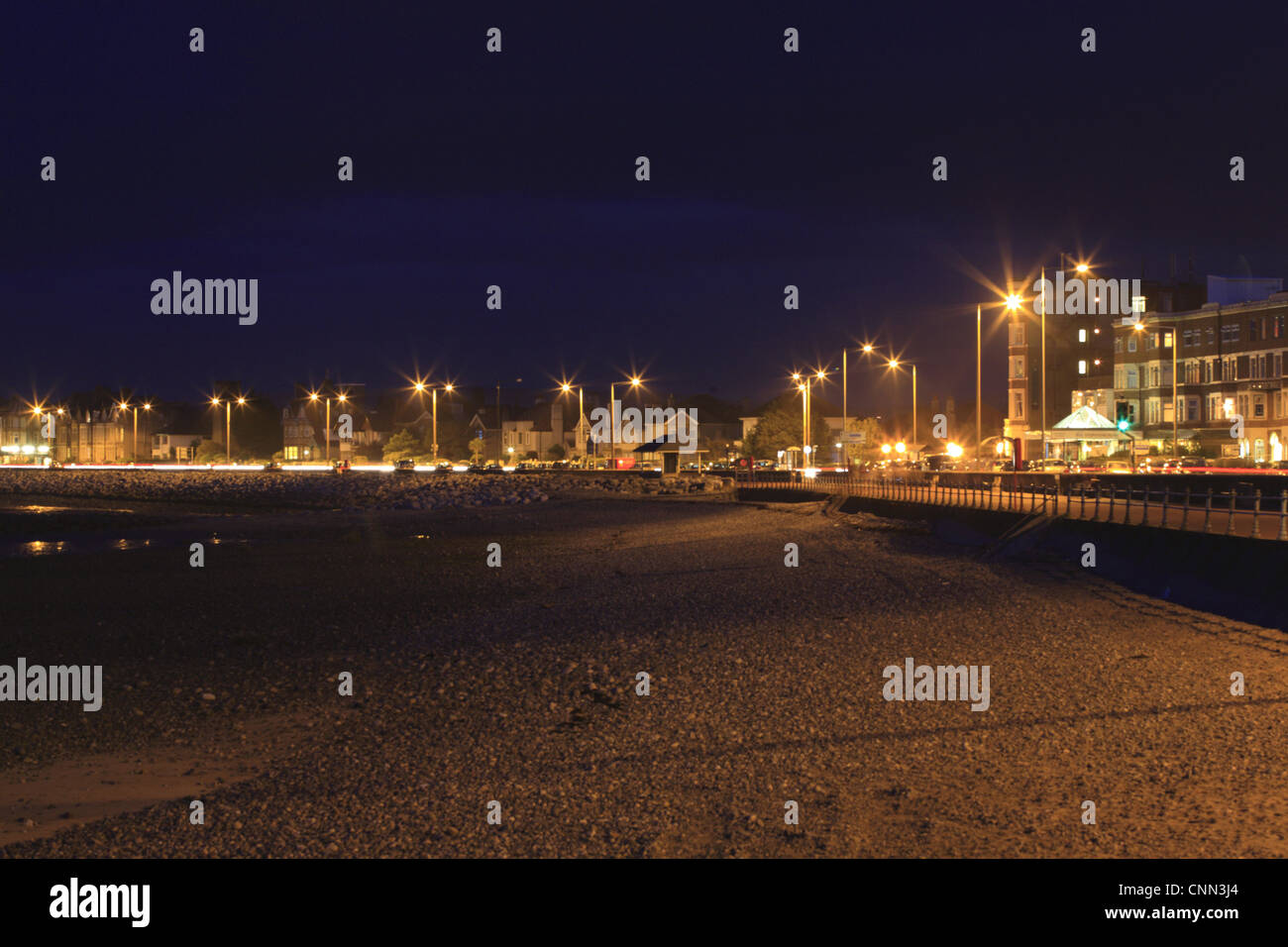 View of seaside resort town beach and promenade at night, Morecambe ...