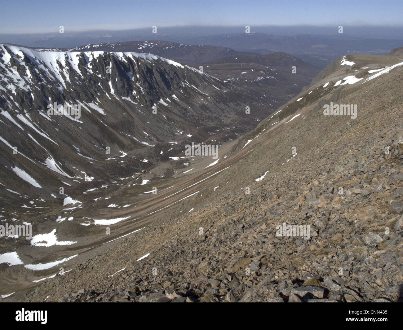 View of upland habitat, with scree slopes and valley, Cairngorm ...