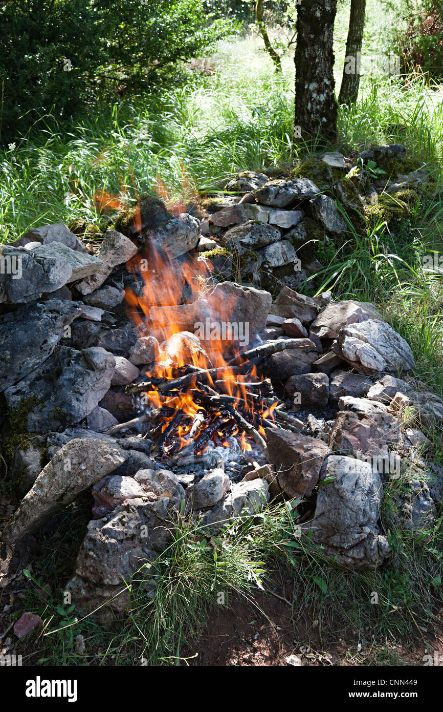 Camp fire in ring of stones, France Stock Photo - Alamy