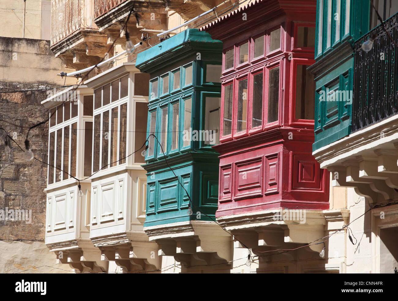 A row of painted traditional bay windows or covered balconies Rabat ...
