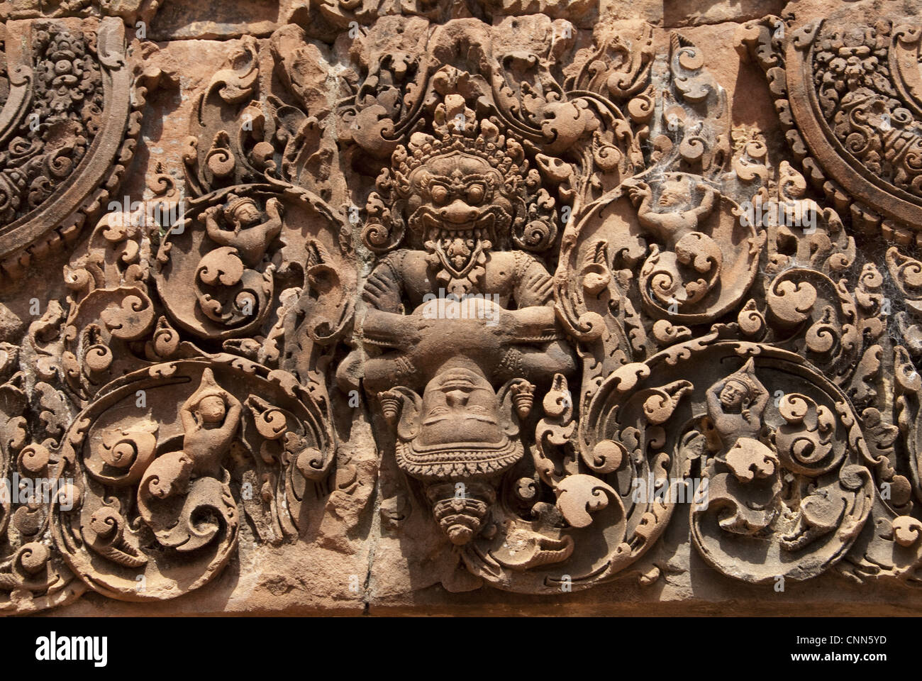 Bas-relief in Khmer Hindu temple depicting Vishnu ripping chest of King ...